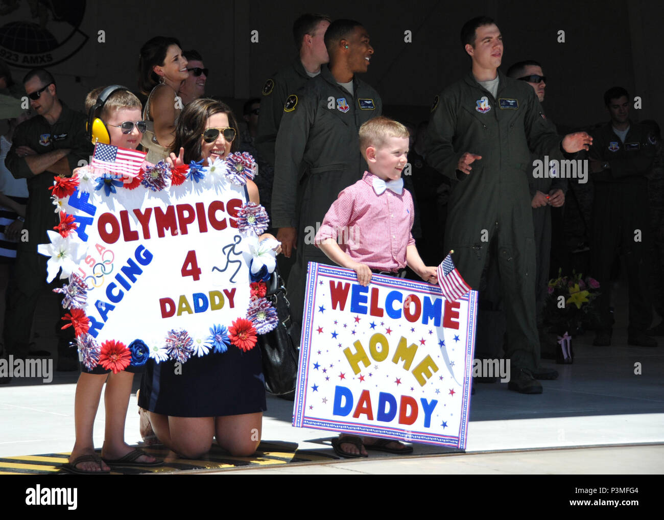 Jennifer Tripp and her sons, Jackson, 6, and Justin, 5, eagerly await ...