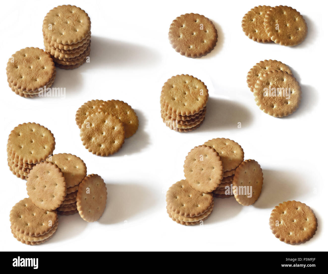 Classic round golden yellow salted cracker isolated on over white ...