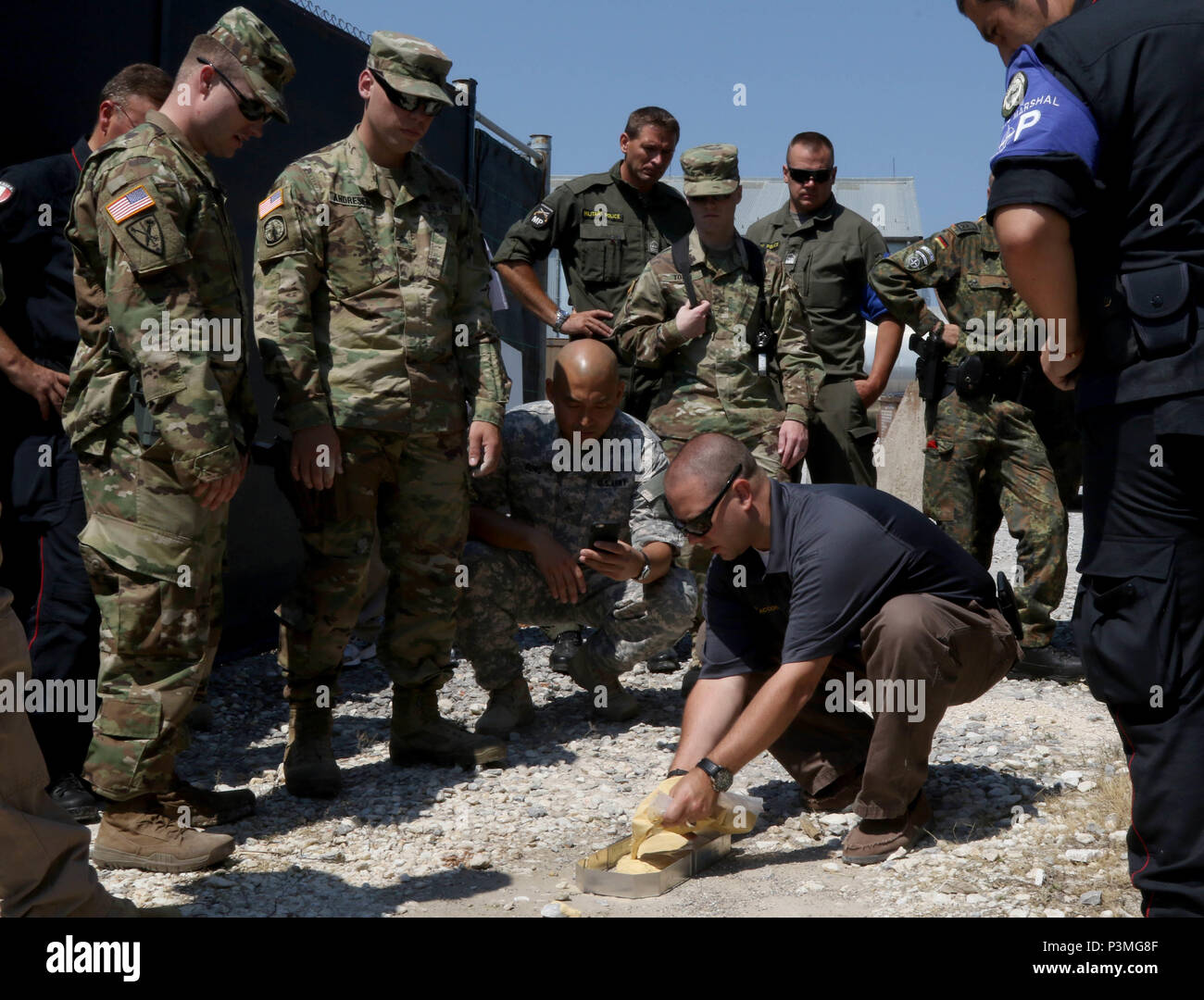 A criminal investigation special agent, from U.S. Army Europe, shows ...