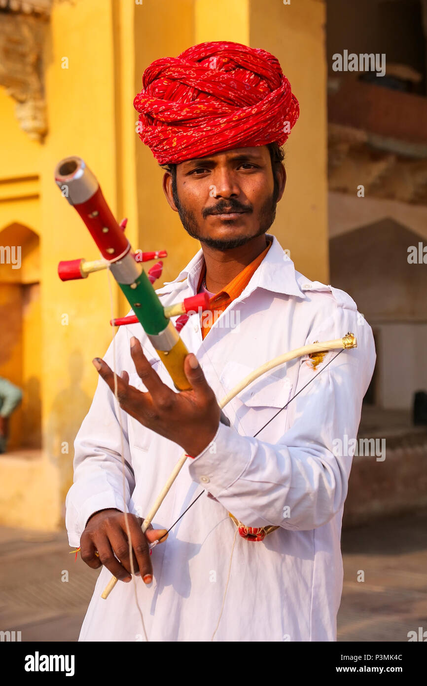 Local man playing ravanahatha in Jaleb Chowk, Amber Fort, Rajasthan ...