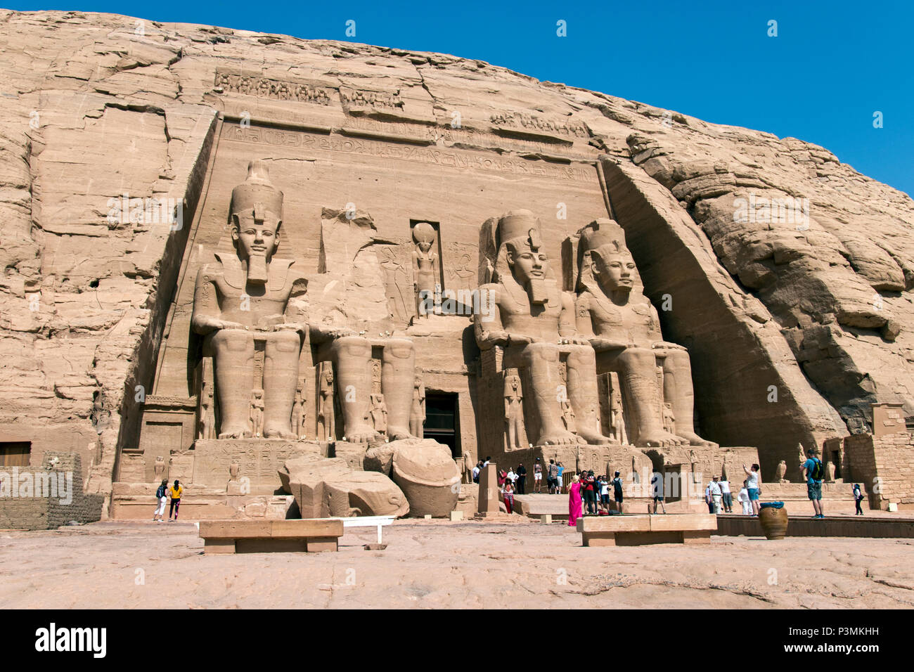 Colossal statues of pharaoh Rameses II decorate the facade of the Great ...