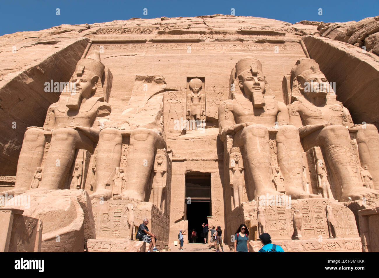 Colossal statues of pharaoh Rameses II decorate the facade of the Great ...