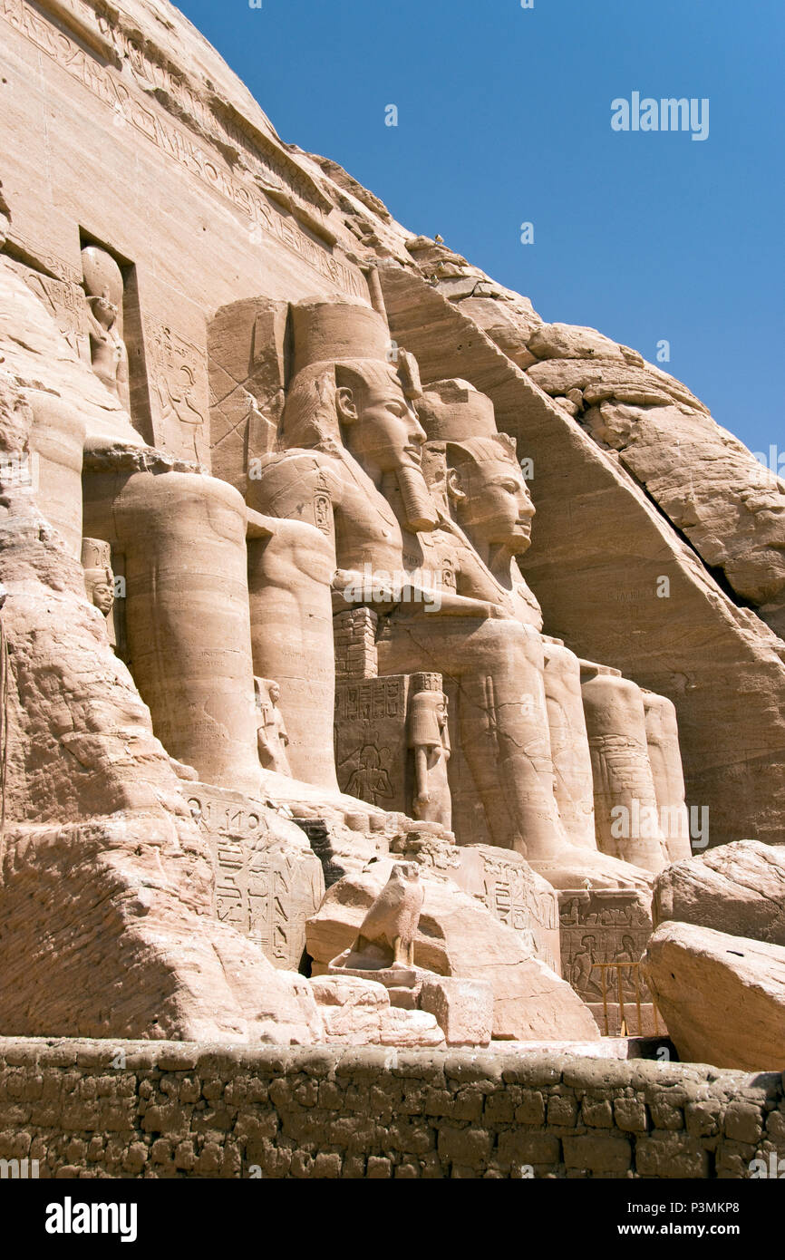 Colossal statues of pharaoh Rameses II decorate the facade of the Great ...