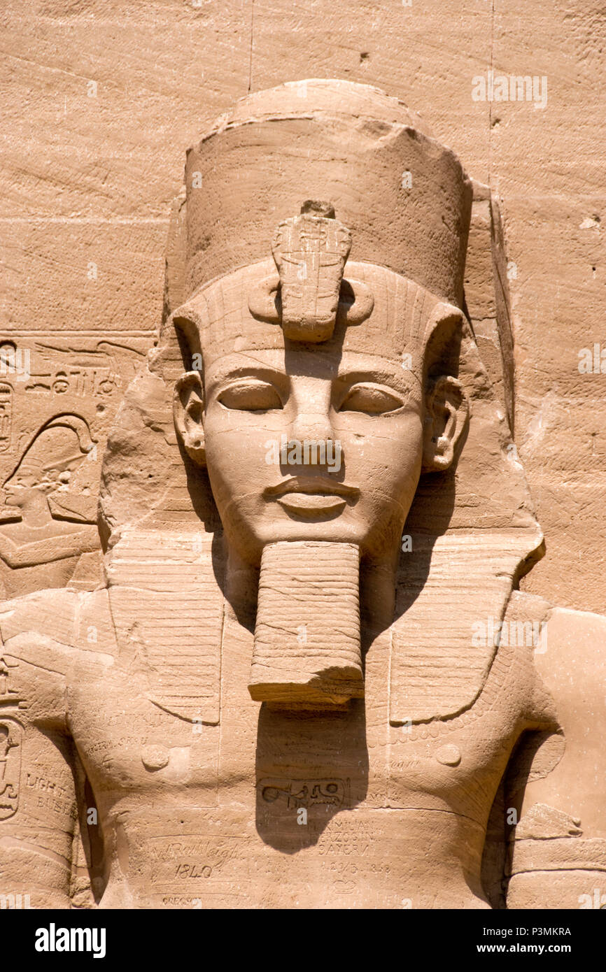 Colossal statues of pharaoh Rameses II decorate the facade of the Great ...