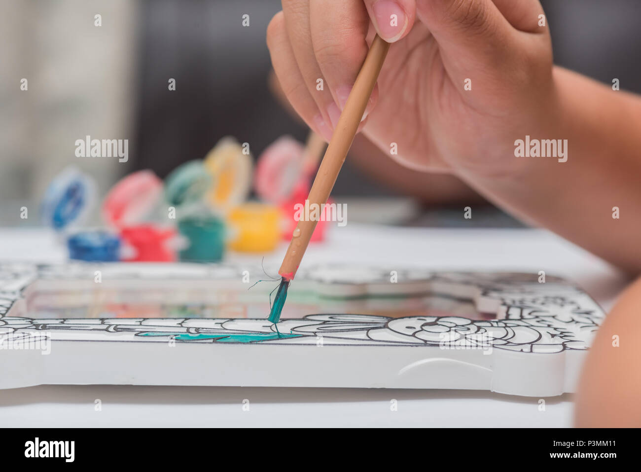 Children learn coloring and painting in classroom Stock Photo - Alamy