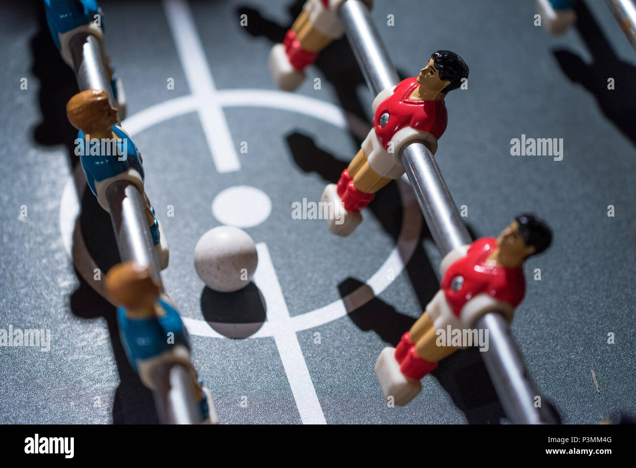 Table football kicker with miniature players Stock Photo - Alamy
