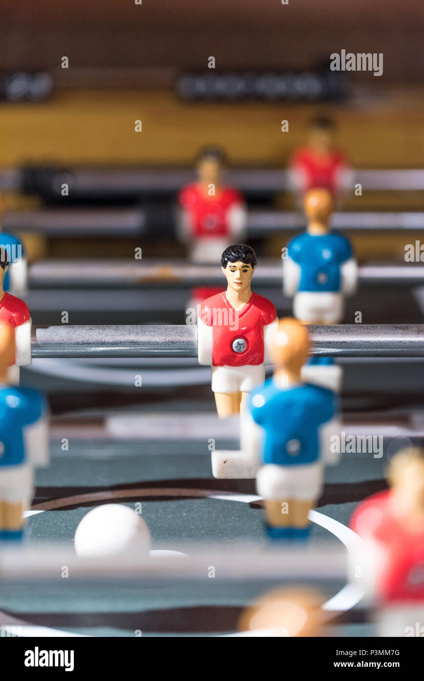 Table football kicker with miniature players Stock Photo - Alamy