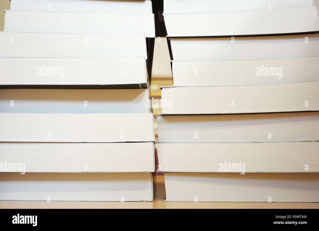 Stack of new books, stacked up to the top, white background for the ...
