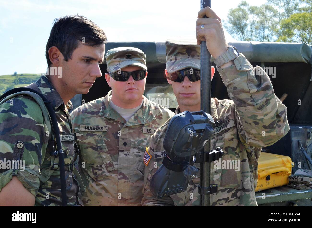 (From left to right) 2nd Lt. Paraschiv Florin, Romanian Land Forces ...
