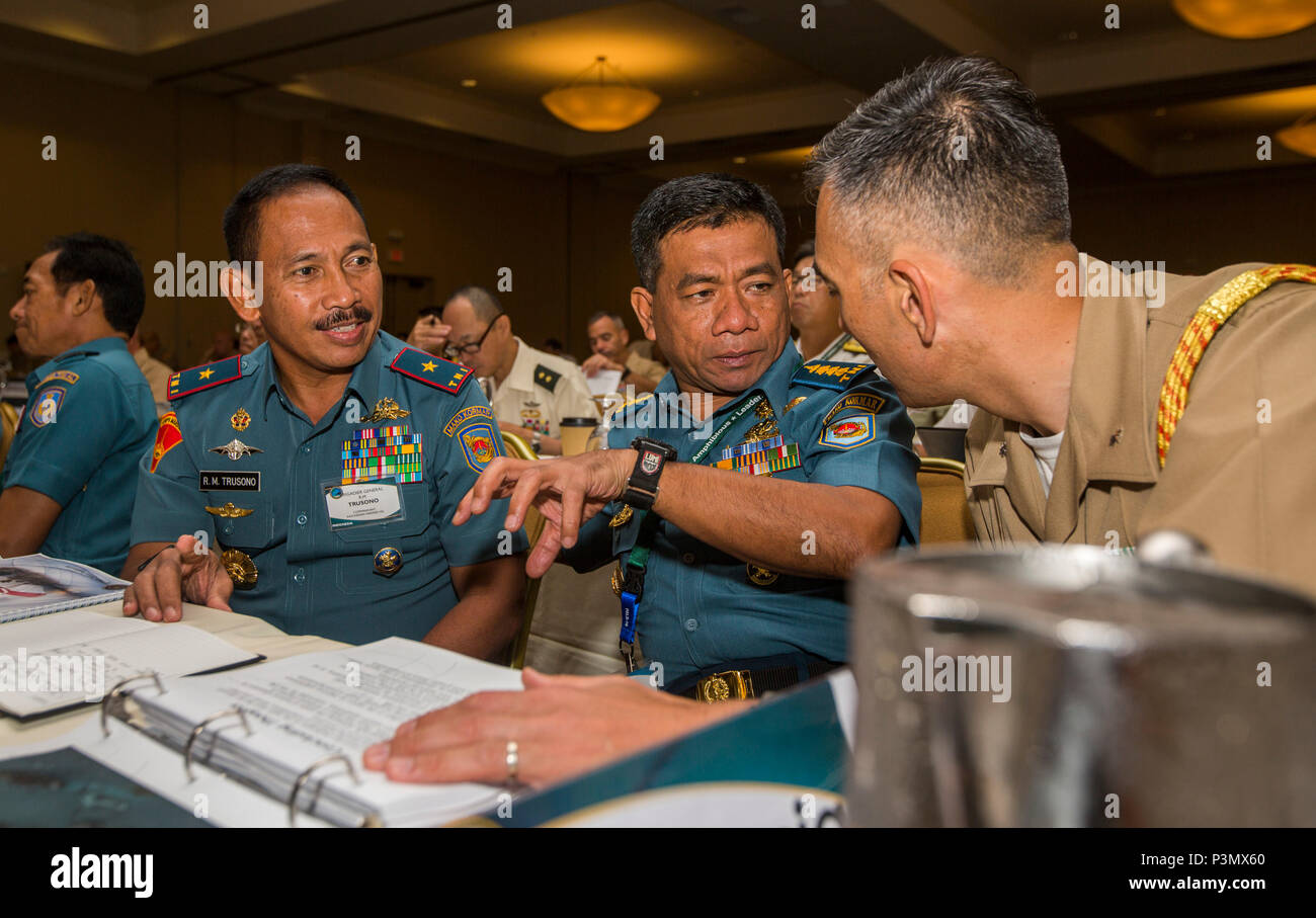 Indonesian Marine Corps Col. Hermanto, center, assistant for planning ...