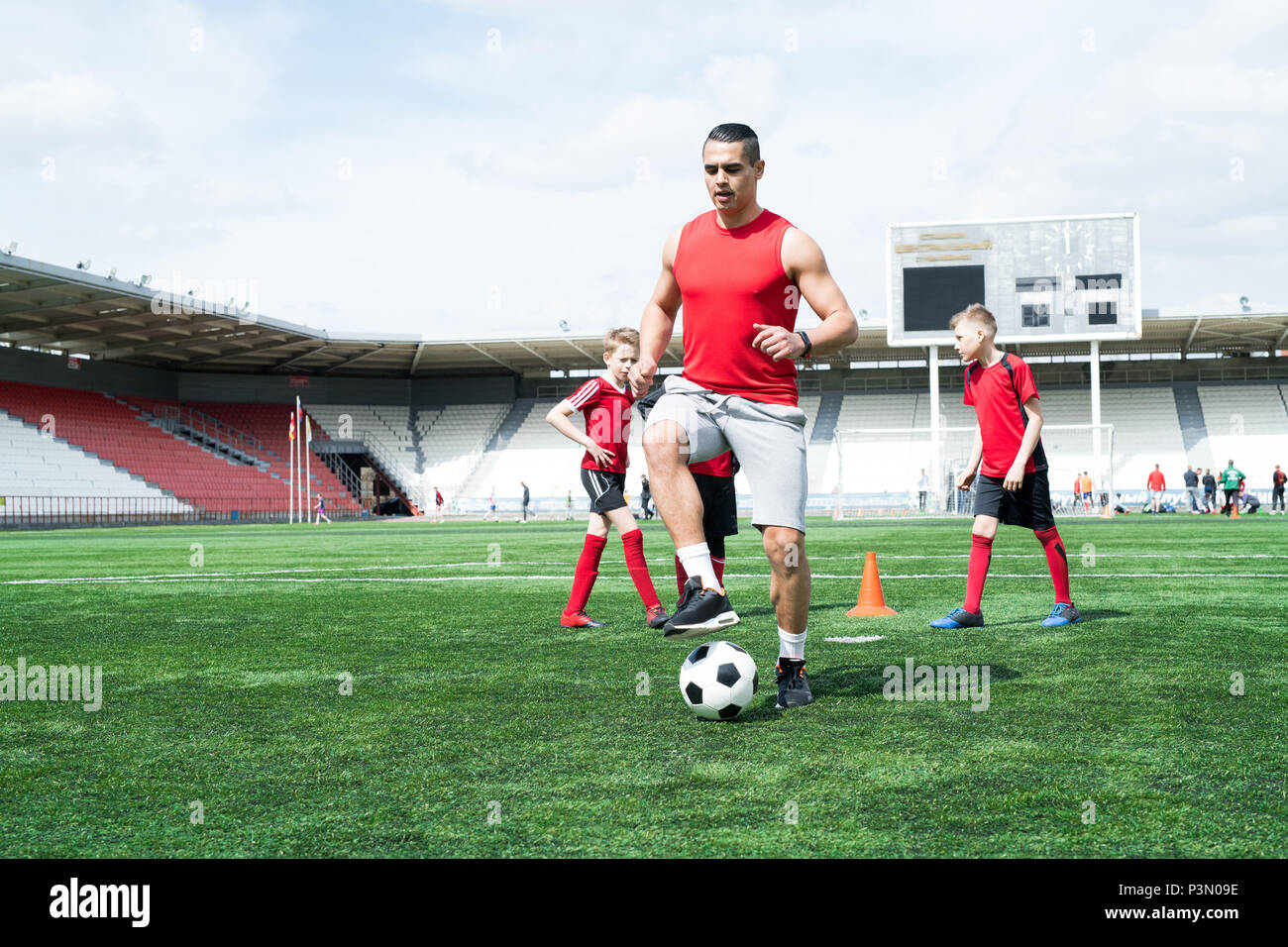 Football Coach on Field Stock Photo - Alamy