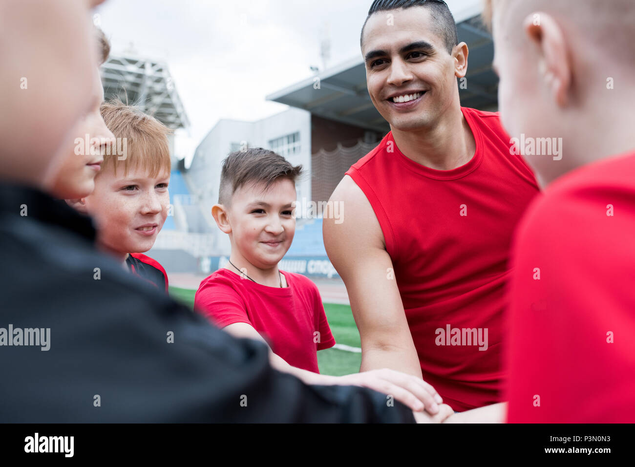 Children huddle hi-res stock photography and images - Alamy