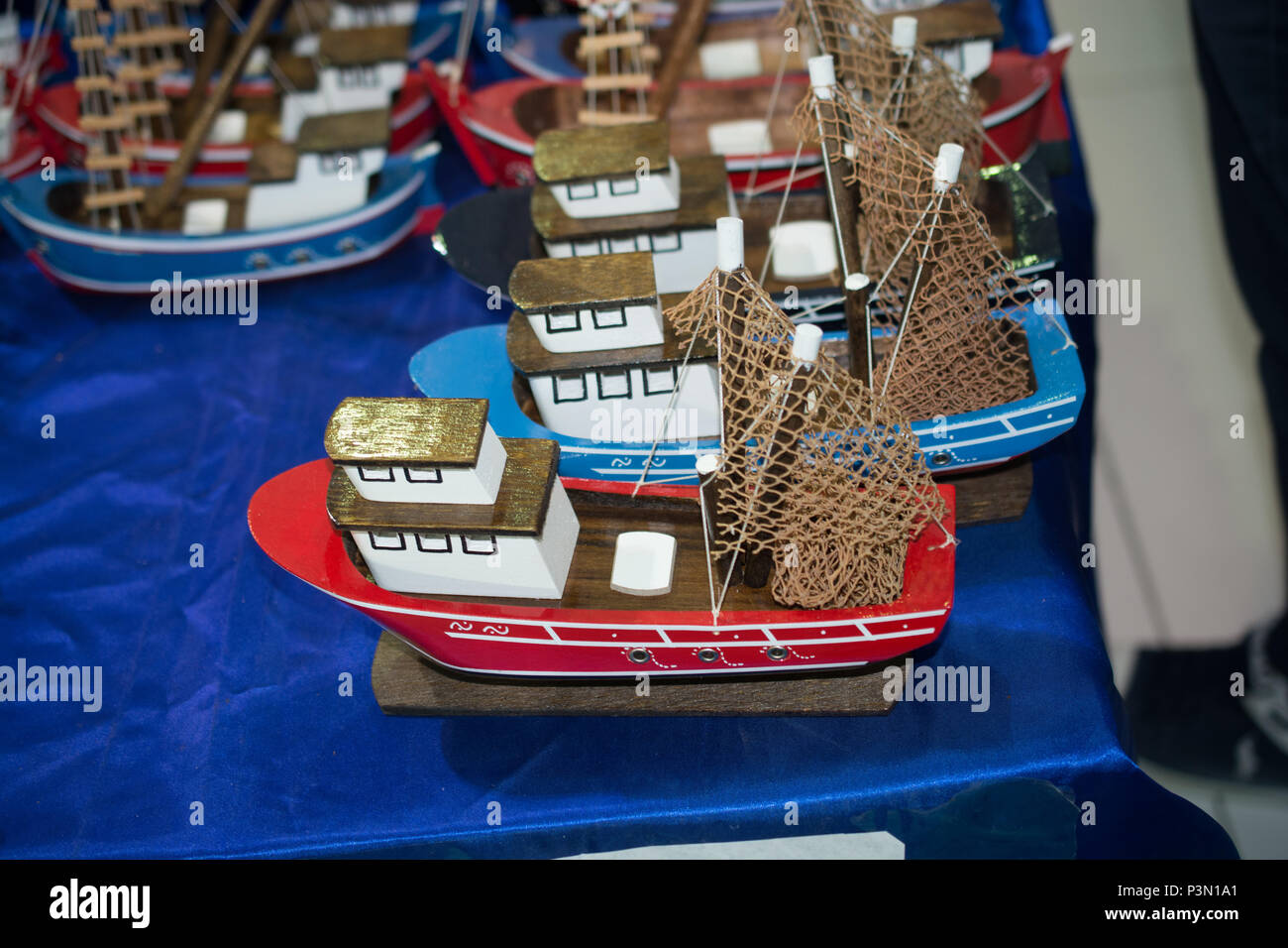 Set of mini size colorful model boats Stock Photo - Alamy