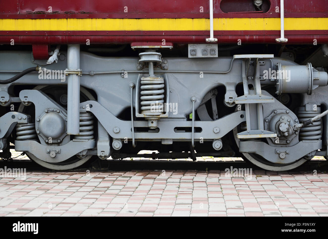 Wheels of a Russian modern locomotive, view from side. Transportation ...