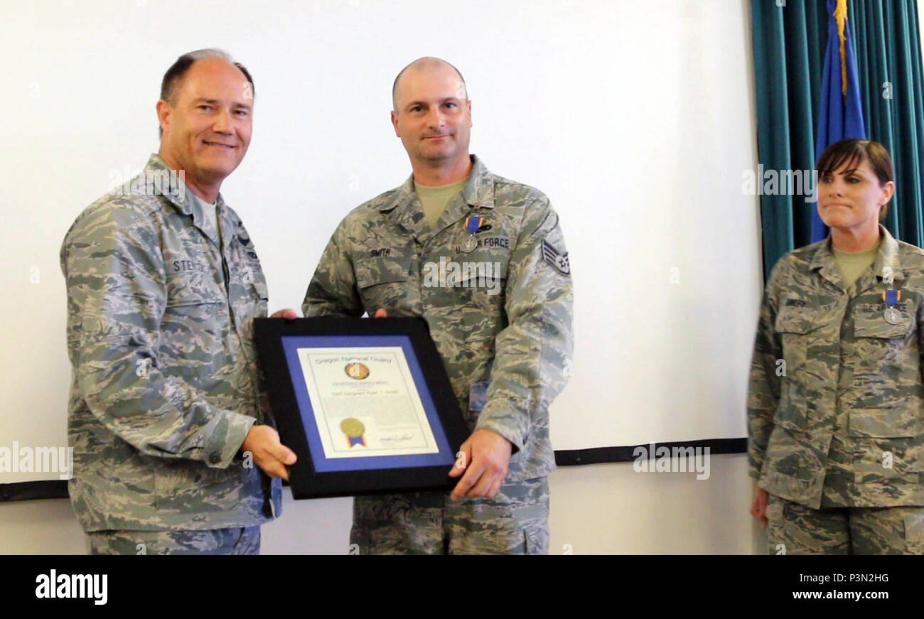 Maj. Gen. Michael E. Stencel, Adjutant General, Oregon, presents the ...