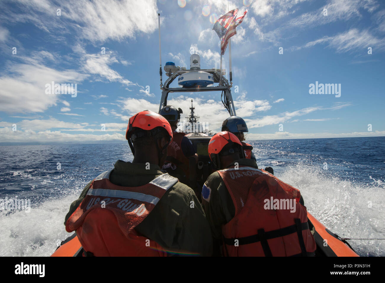 Coast Guard Cutter Stratton's crewmembers transit aboard a Coast Guard ...