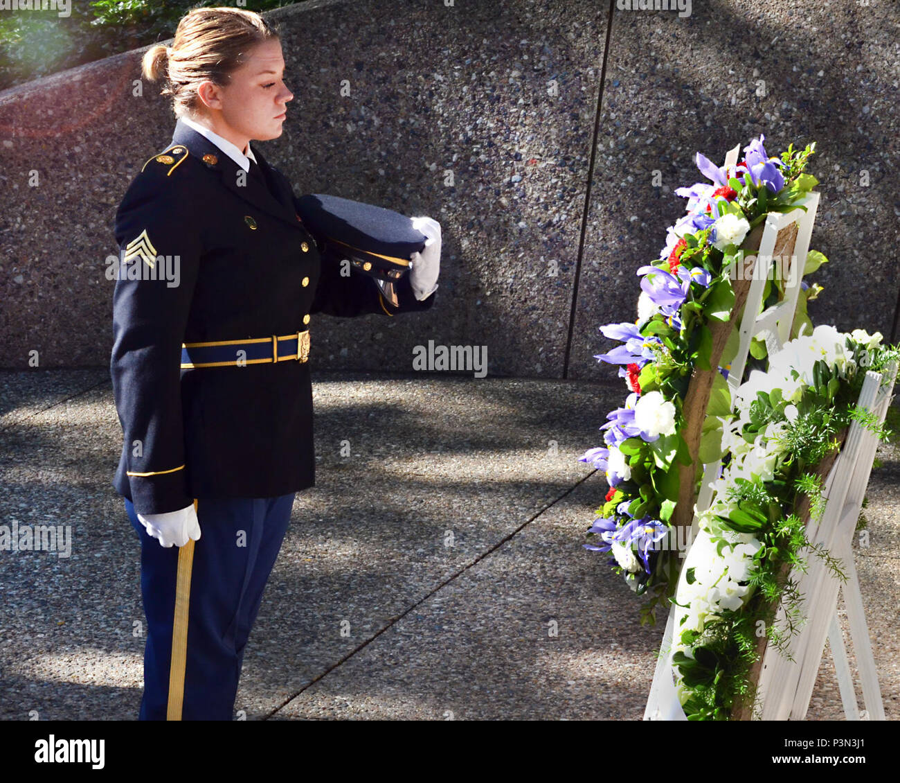 Sgt. Alicia Young, Michigan National Guard Funeral Honors Team, renders ...