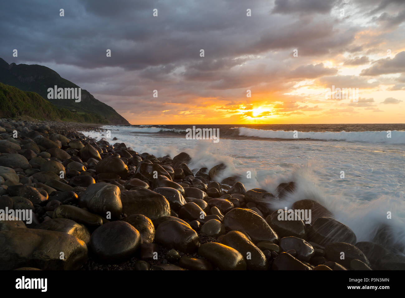 Boulder beach in Batanes - Philippines Stock Photo - Alamy