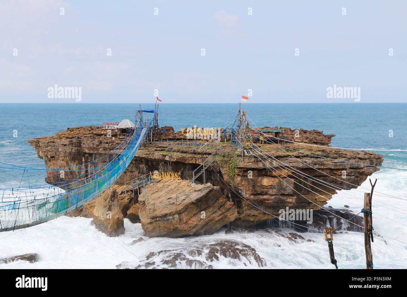 Suspension bridge connecting to the Timang Beach in sunny day ...