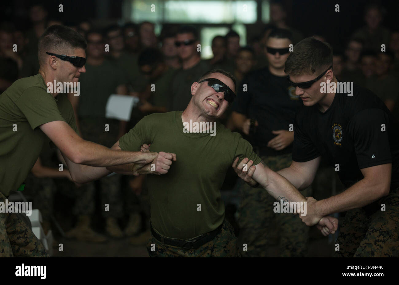 Marines with 3rd Battalion, 2nd Marine Regiment tenses up when struck ...