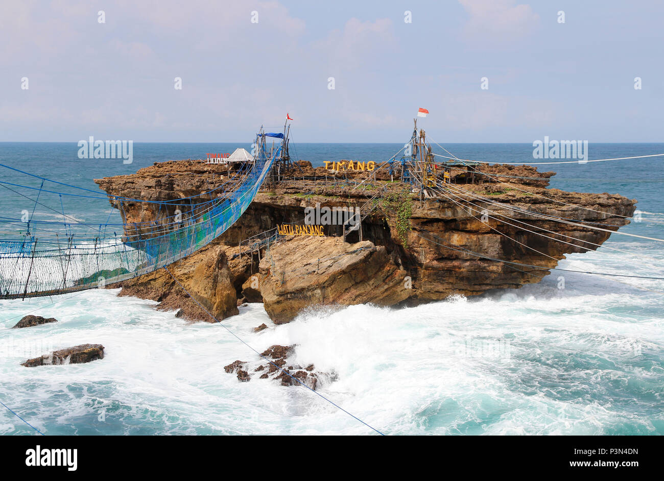 Suspension bridge connecting to the Timang Beach in sunny day ...
