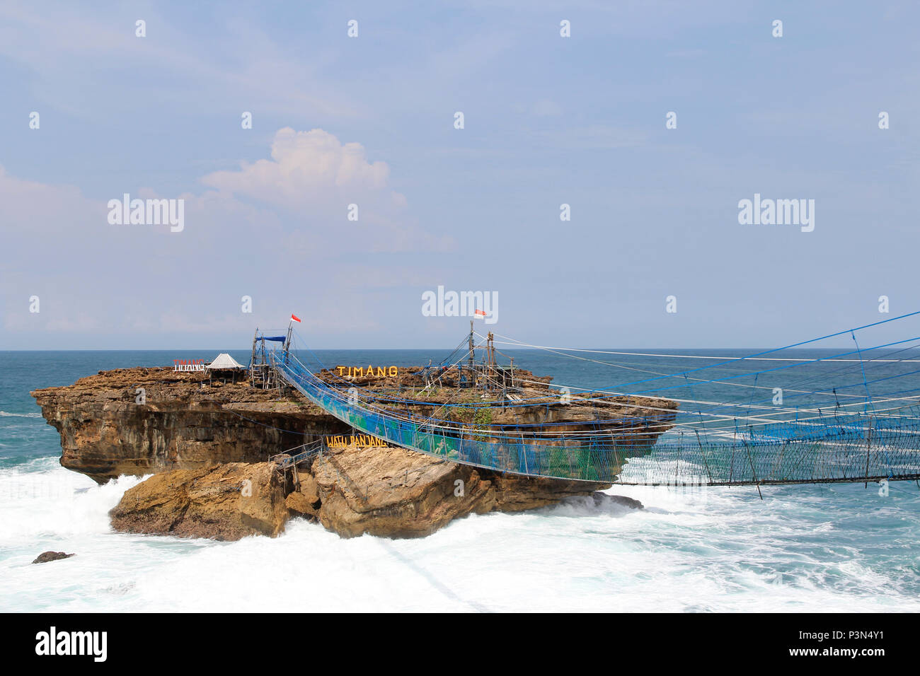 Suspension bridge connecting to the Timang Beach in sunny day ...