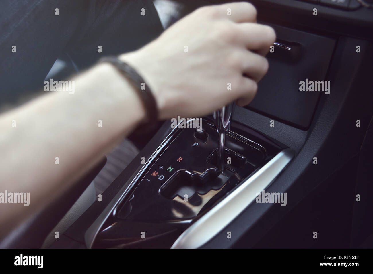 Hand Holding Automatic Transmission In his Car Stock Photo - Alamy