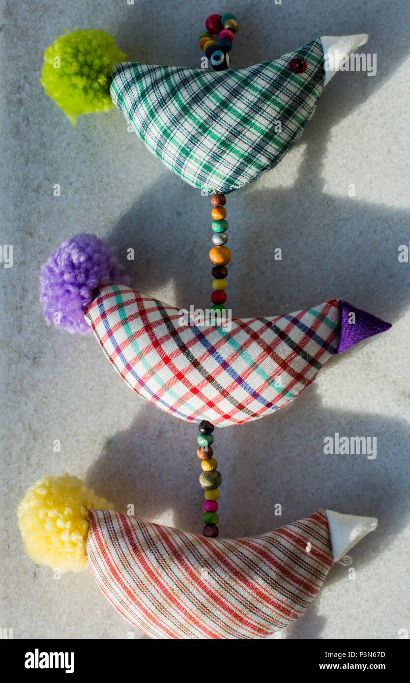 Artificial bird made out of colored handicrafts elements Stock Photo ...