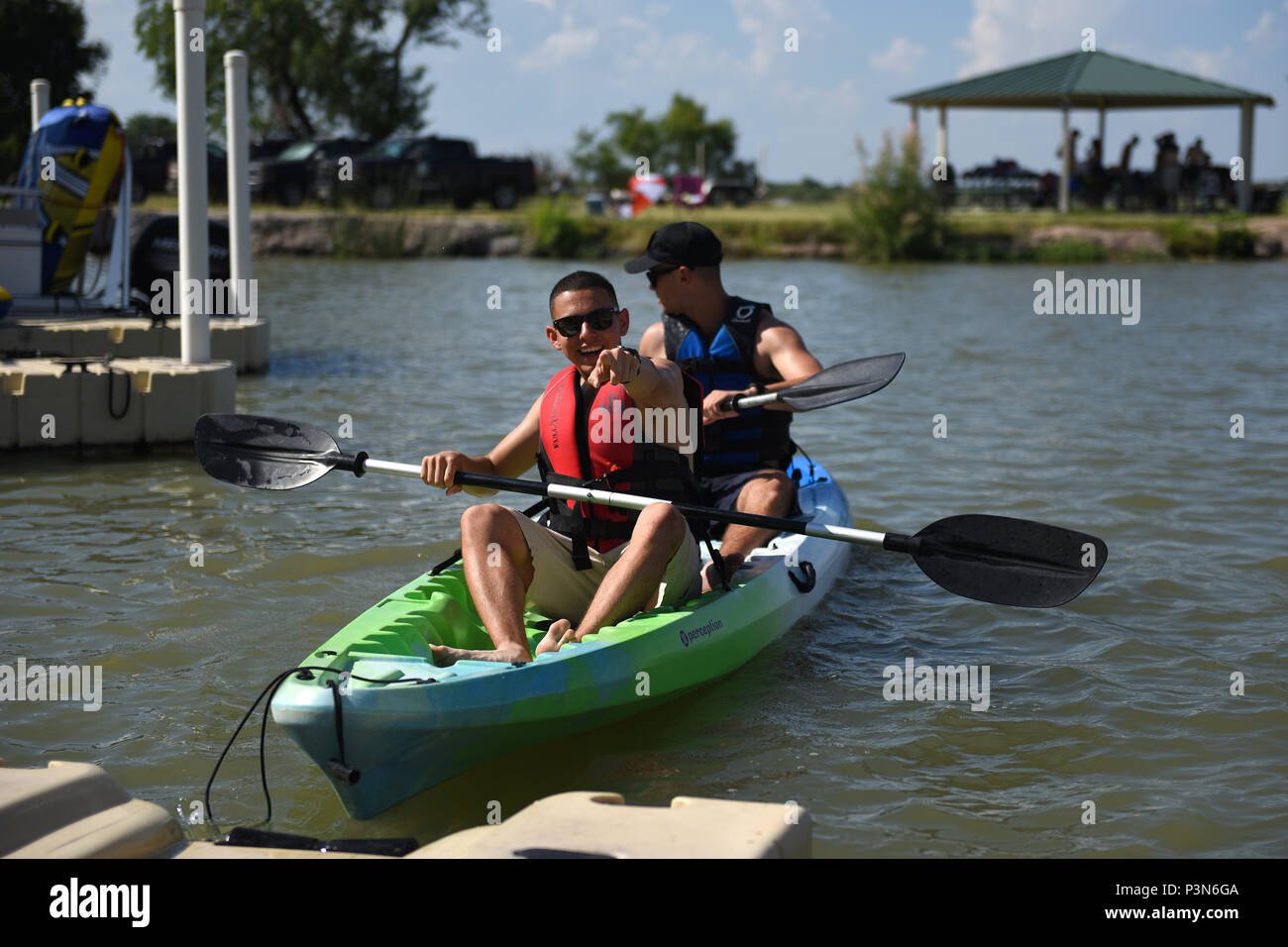 Goodfellow Air Force Base members row a kayak during the 4th of July ...