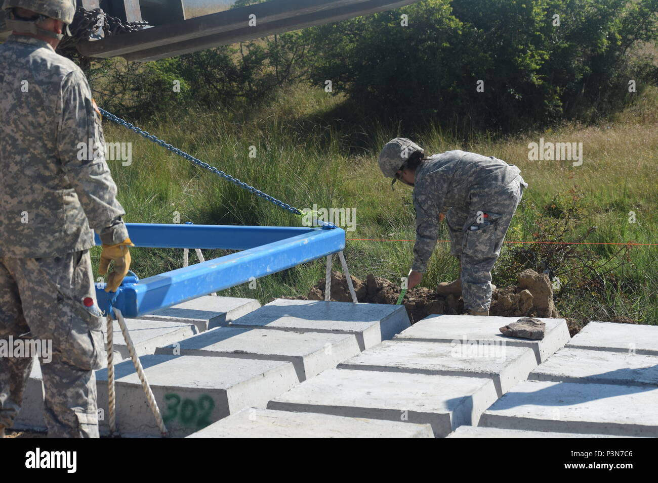 Sgt. Del Los Reyes, a military engineer with the 841st Engineer ...