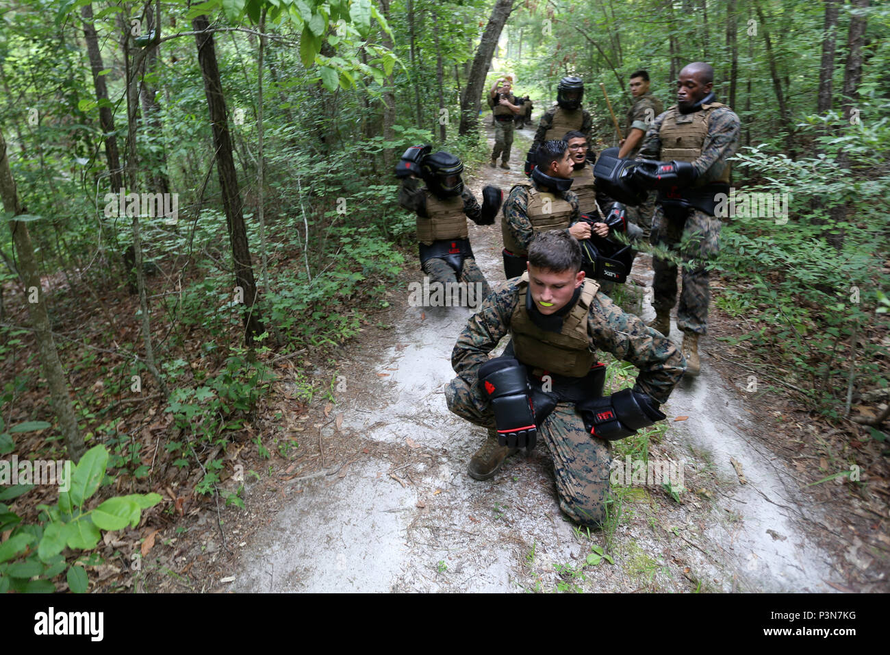 Marines with Marine Wing Communication Squadron 28 adjust their gear ...