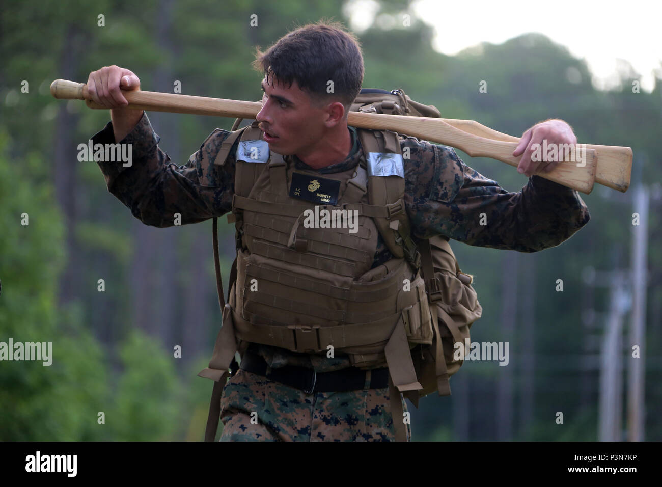 Cpl. Anthony Barnett hikes a trail during the four-and-a-half mile ...