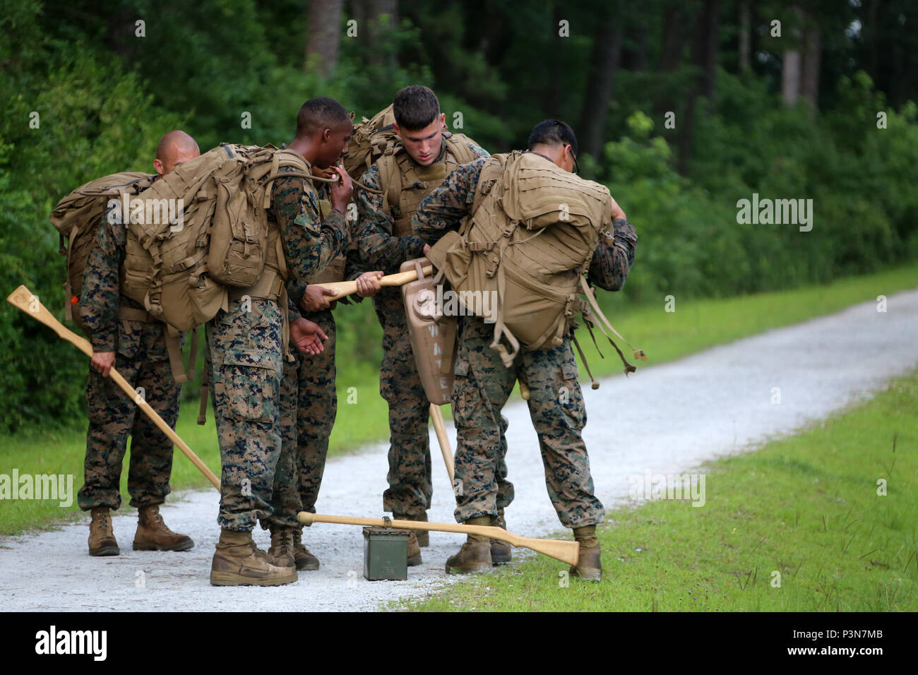 Marines with Marine Wing Communication Squadron 28 gather their gear ...