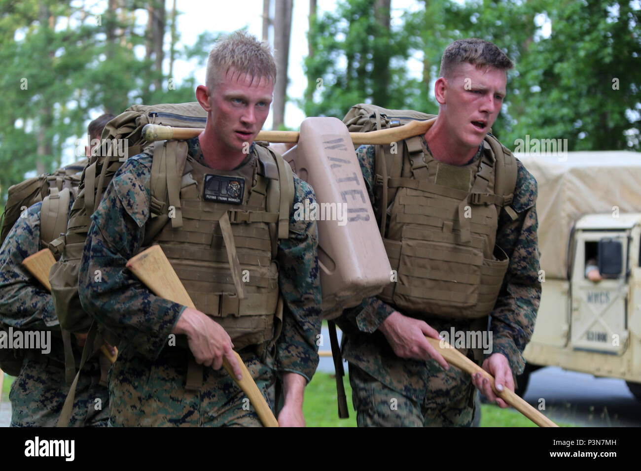 Marines with Marine Wing Communication Squadron 28 hike a trail during ...