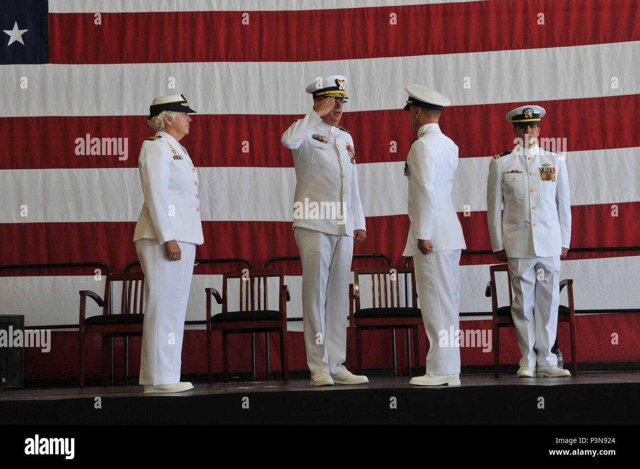 Capt. Keith Overstreet (center right), new commanding officer of Coast ...
