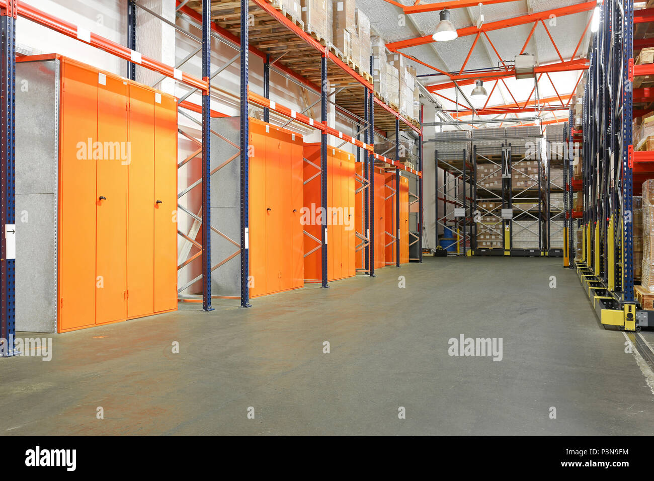 Lockers and Storage Shelves in Warehouse Stock Photo - Alamy