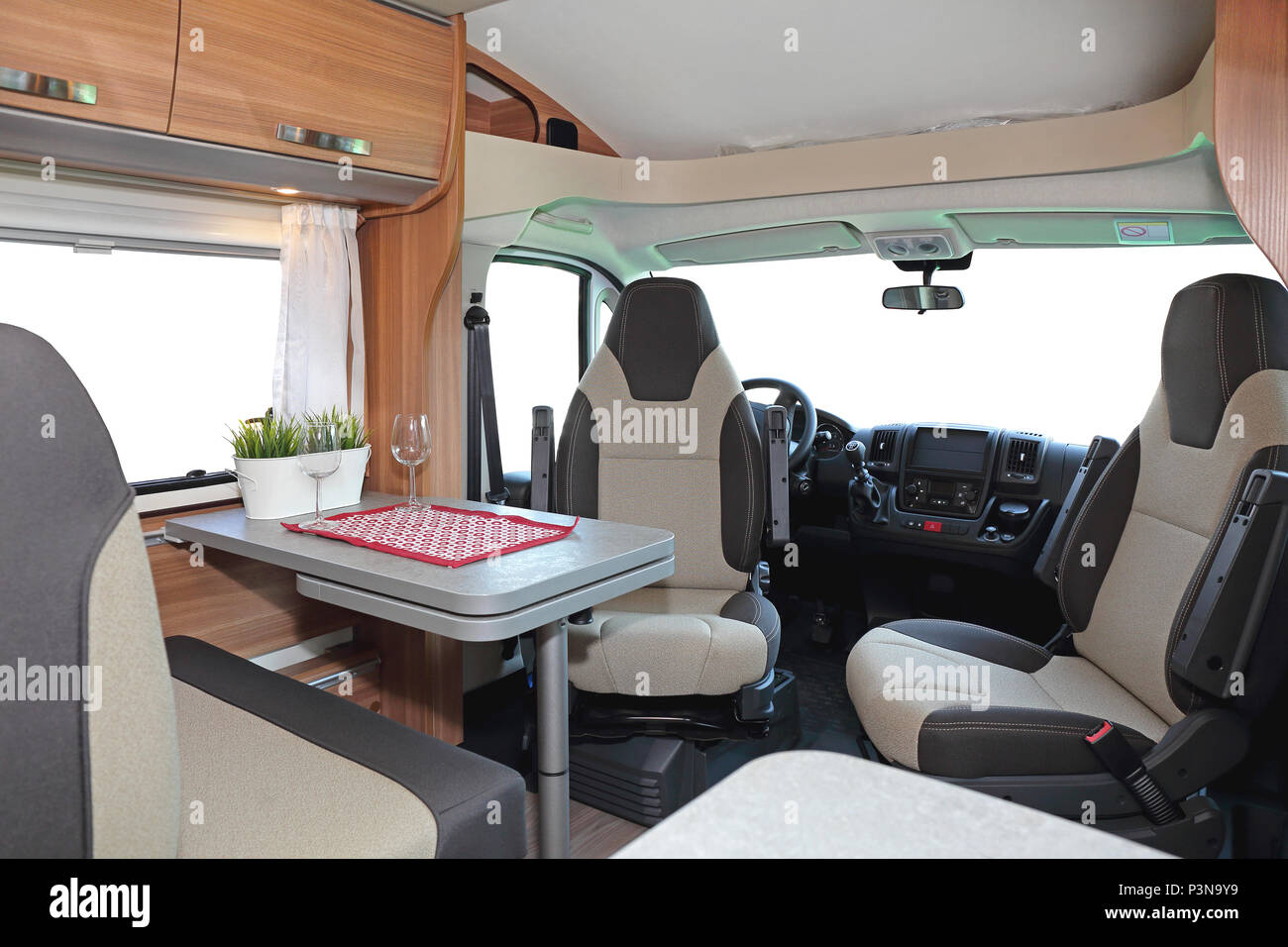 Camping van interior cabin with seating for four Stock Photo - Alamy