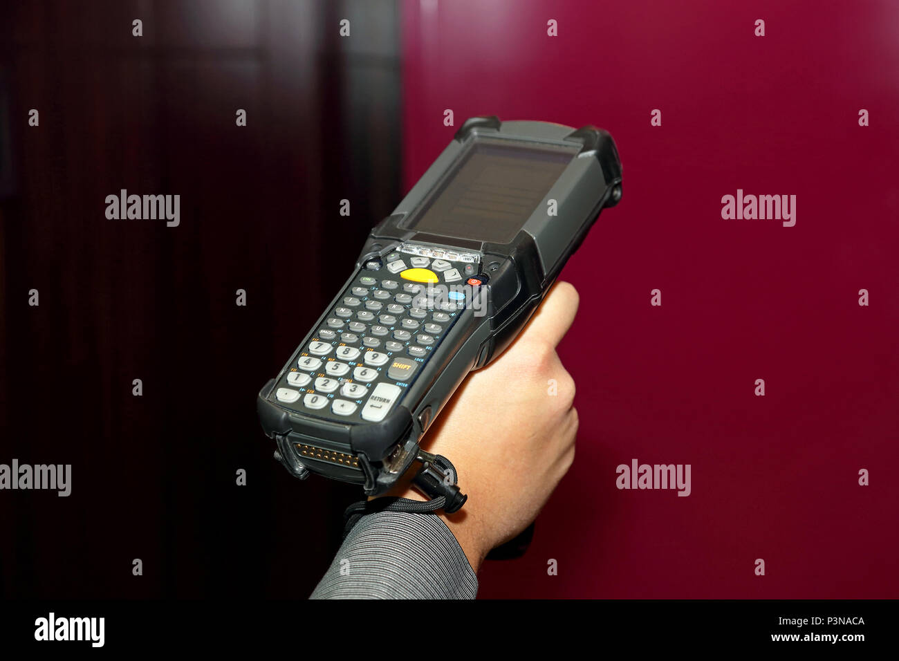 Handheld barcode scanner hi-res stock photography and images - Alamy