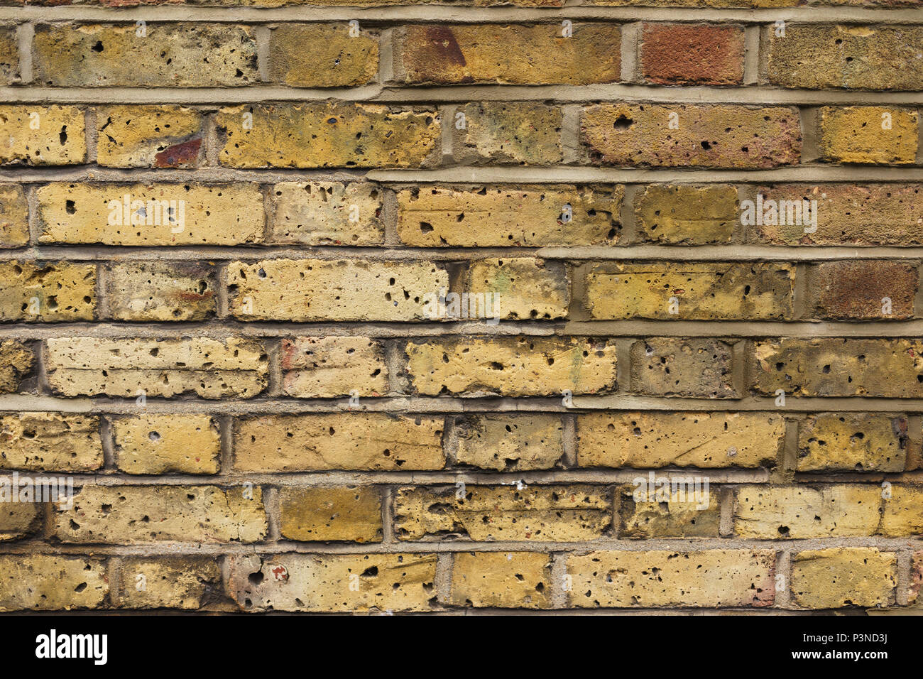 Yellow brick wall. Background and texture. Construction concept ...