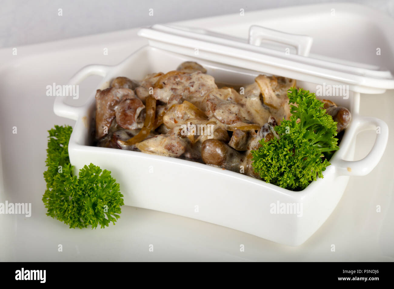 Baked Chicken offals Stock Photo - Alamy