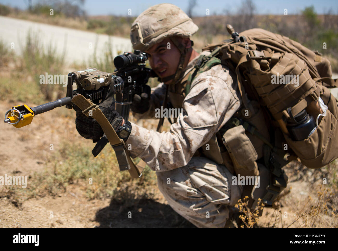 Lance Cpl. Jaime J. Camacho takes aim at a simulated enemy for 1st ...