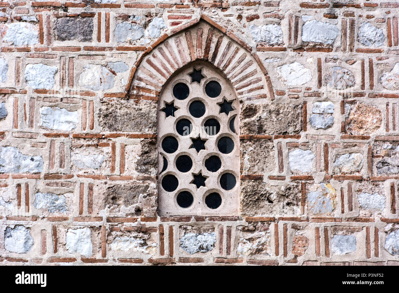 Detail of old stone window and facade on mosque. Islamic style ...