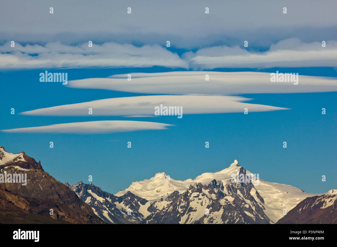 Lenticular and cumulus clouds above peaks, Fitzroy Massif, Los ...