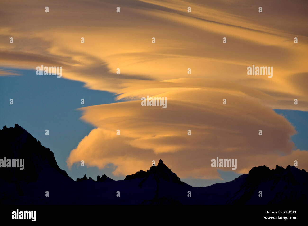 Lenticular and cumulus clouds above peaks, Fitzroy Massif, Los ...