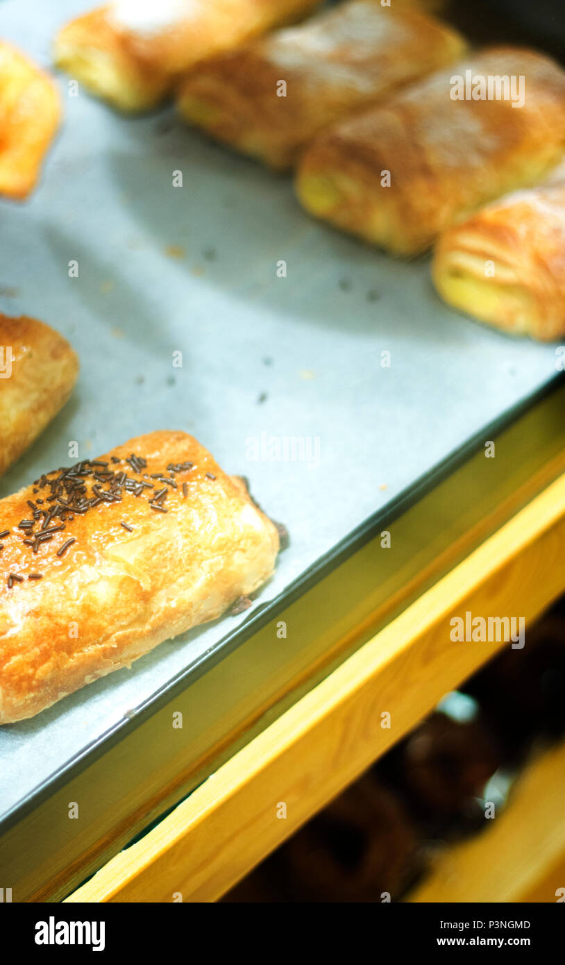 Freshly baked croissants in bakery bread shop on sale in the store ...
