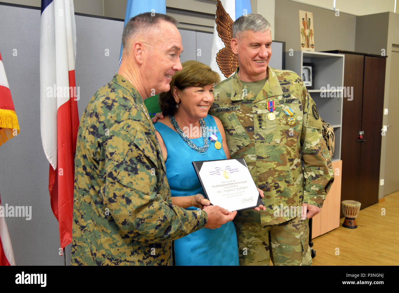 Ginny Rodriguez is awarded the Distinguished Public Service Award for ...