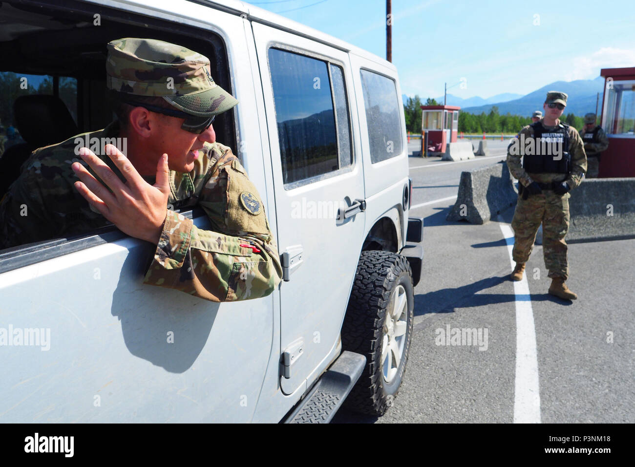 A role-playing soldier, left, questions a Military Police soldier ...