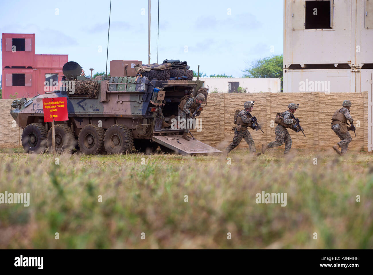 United States Marine Corps personnel dismount an Australian Army ASLAV ...
