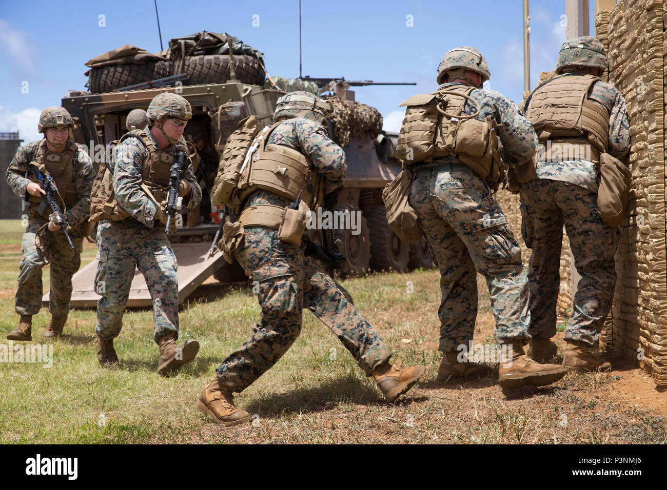 United States Marine Corps personnel dismount an Australian Army ASLAV ...