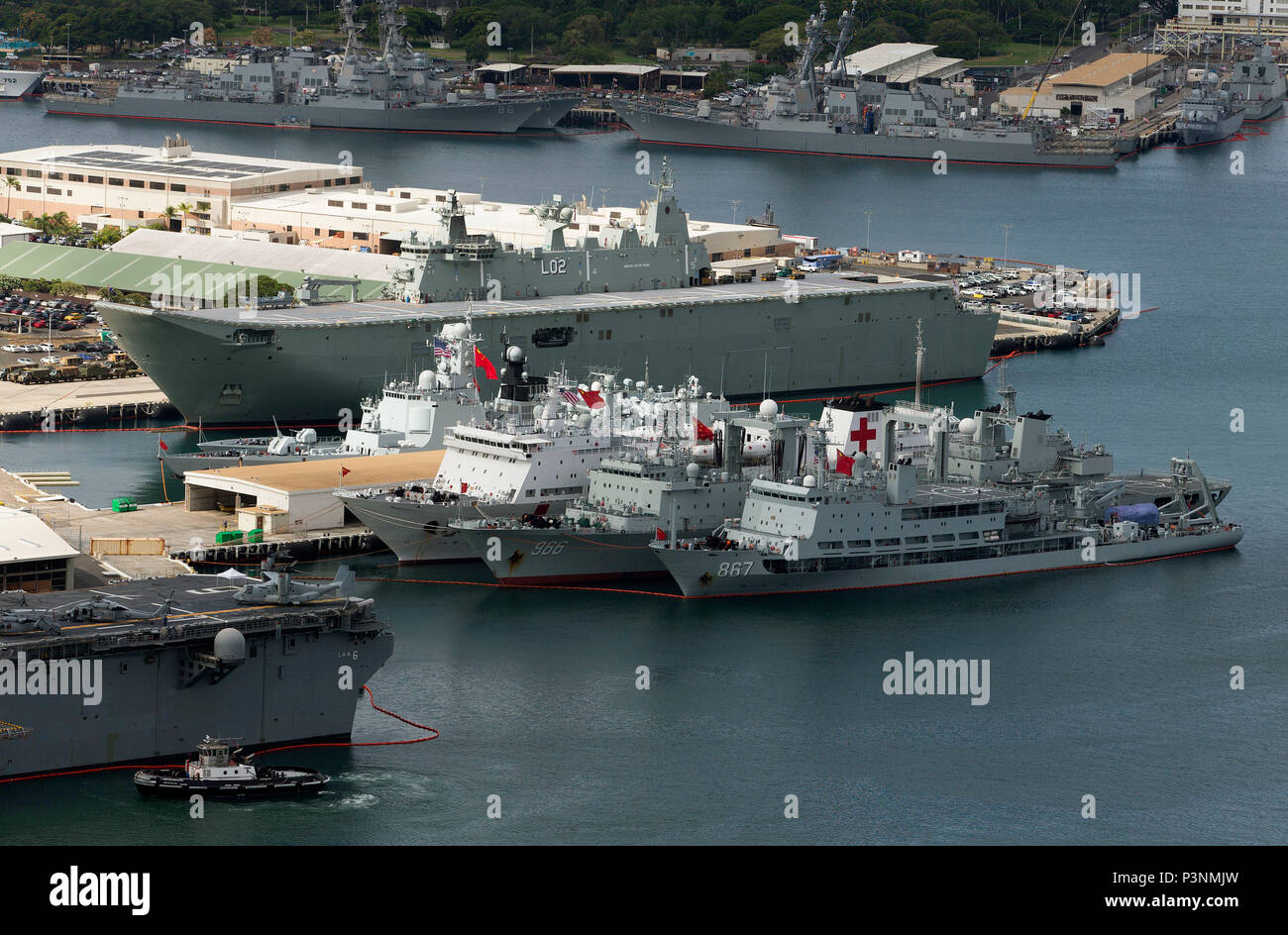 HMAS Canberra (L02) sit amongst ships from participating nations of ...
